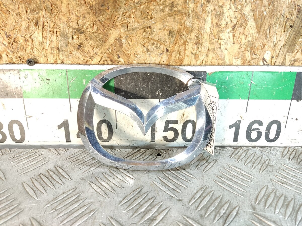 Эмблема MAZDA CX7 2007-2012 EG2151730