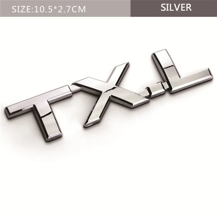 Эмблема TXL серебристая 10,5*2,7см