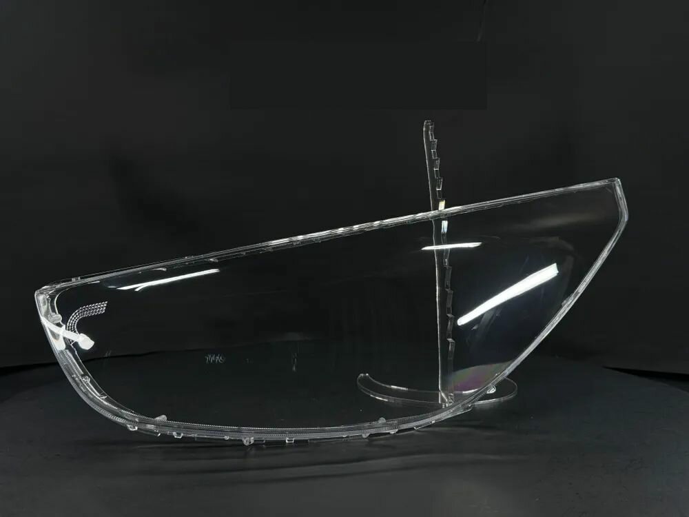 Стекло левой фары для автомобиля Hyundai Tucson 2 IX35 2009-2015