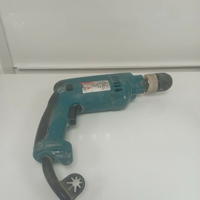 Дрель Makita HP1620