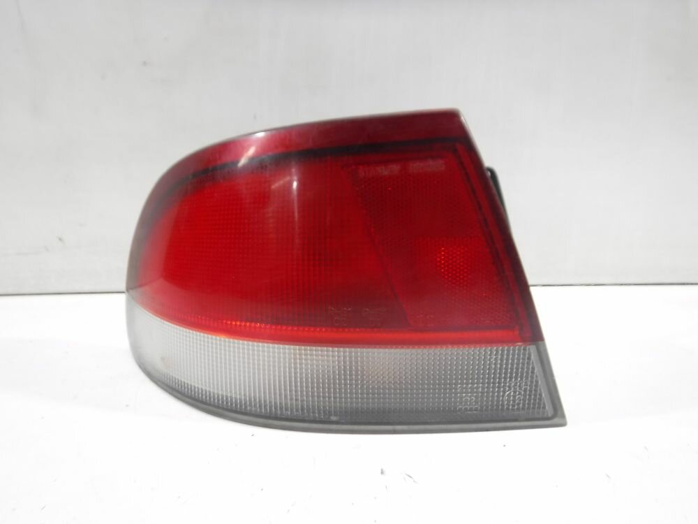 Фонарь задний левый Mazda 626 GE