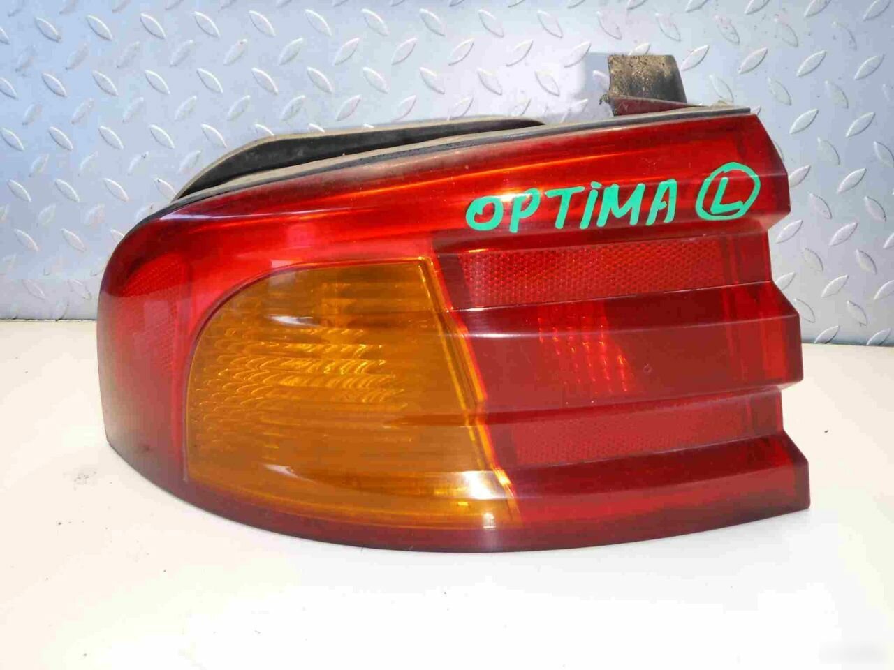 Фонарь задний наружный левый Kia Optima I (2000—2002) 924113C000