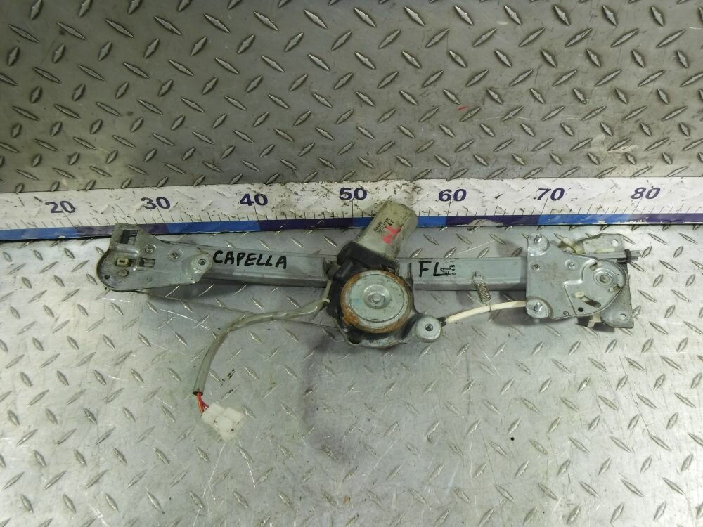 Стеклоподъемник передний левый Mazda Capella GA7C59560D