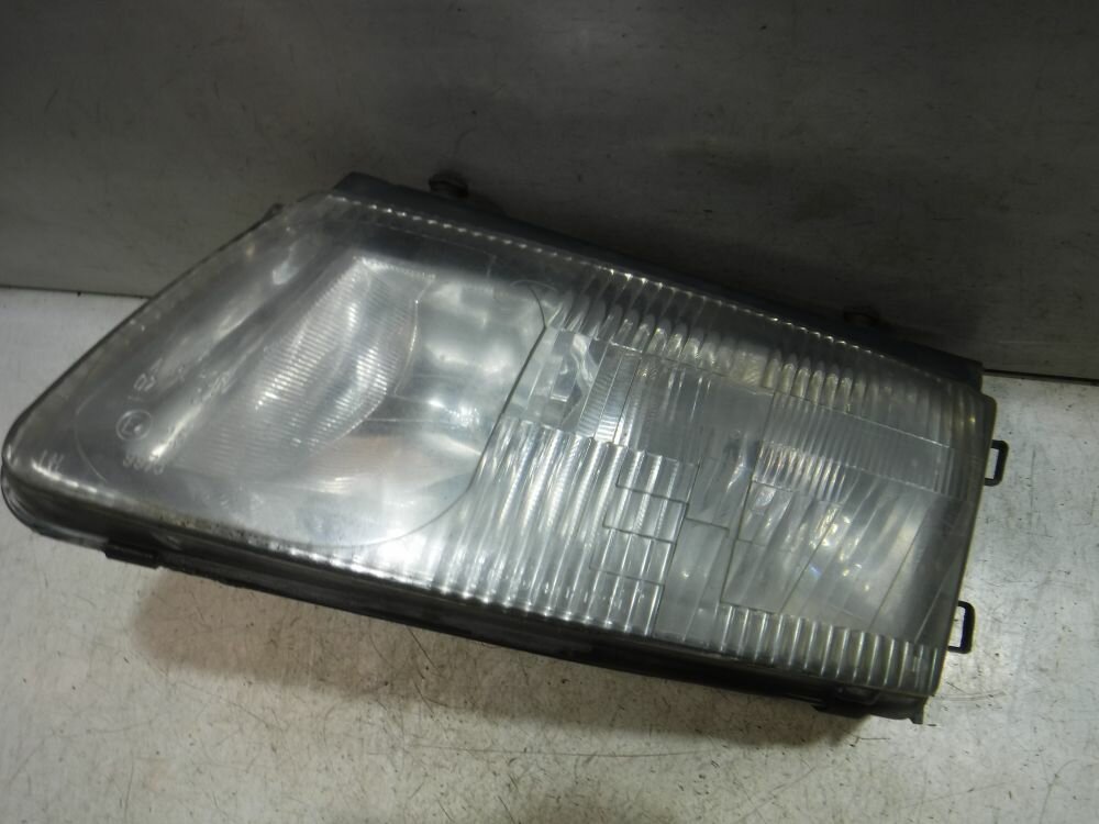 Фара левая VW Passat B5 4411125RLDEM