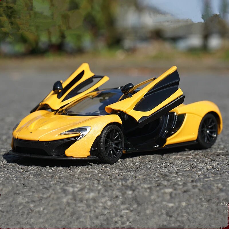 Модель автомобиля McLaren P1 Welly 1:24, желтый