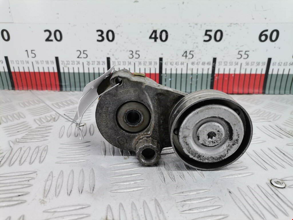 Натяжитель ремня генератора (приводного поликлинового ремня Opel Astra H 55563512 арт. 1919144