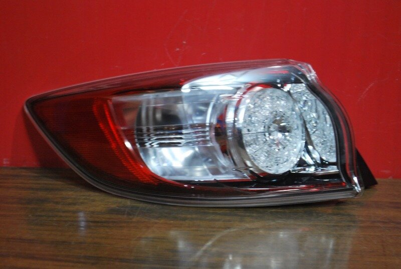 Фонарь наружный задний левый Mazda 3 Bl BCW951160C