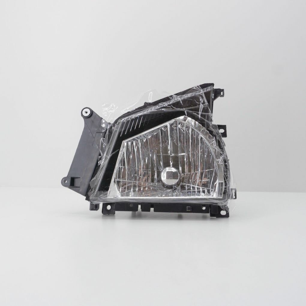 Фара ISUZU ELF с 2003 г левая, AUTODEPO (с электрокорректором)