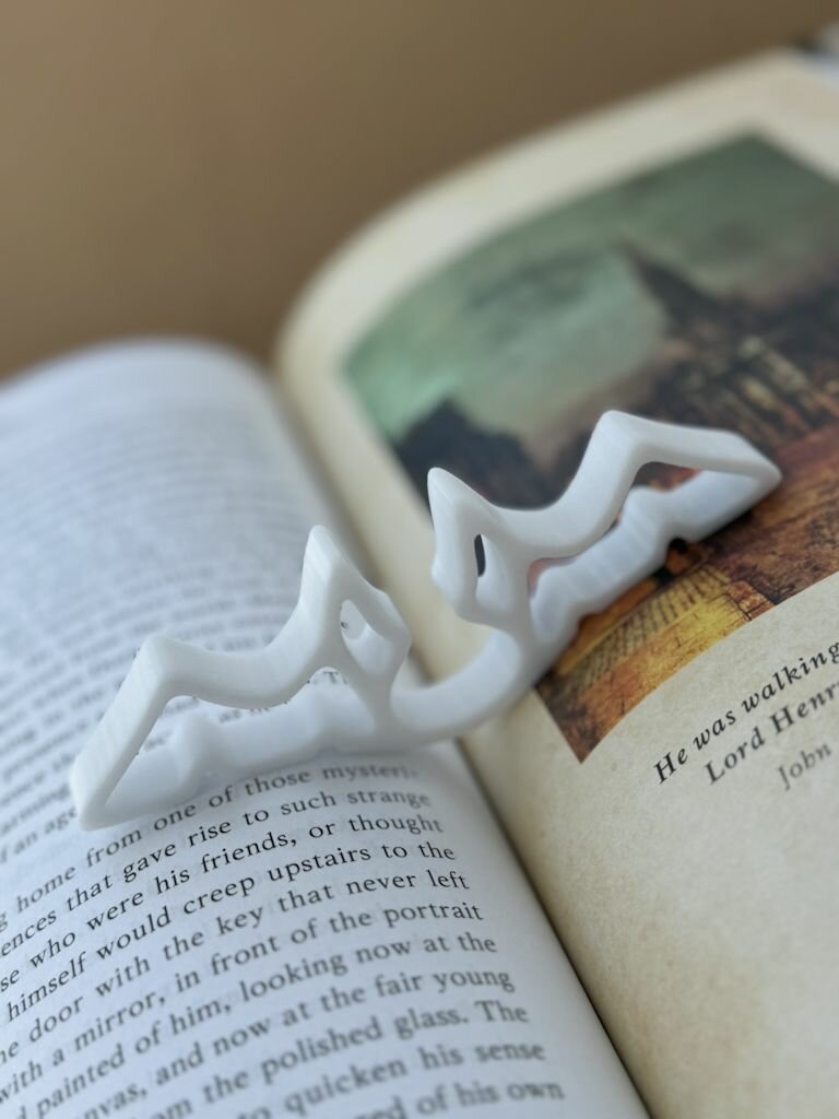 Держатель для книжных страниц