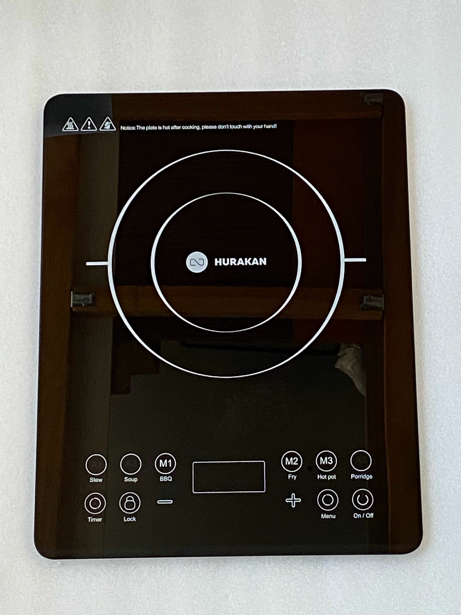 Стеклокерамическая поверхность для индукционной плиты Hurakan HKN-ICF18T