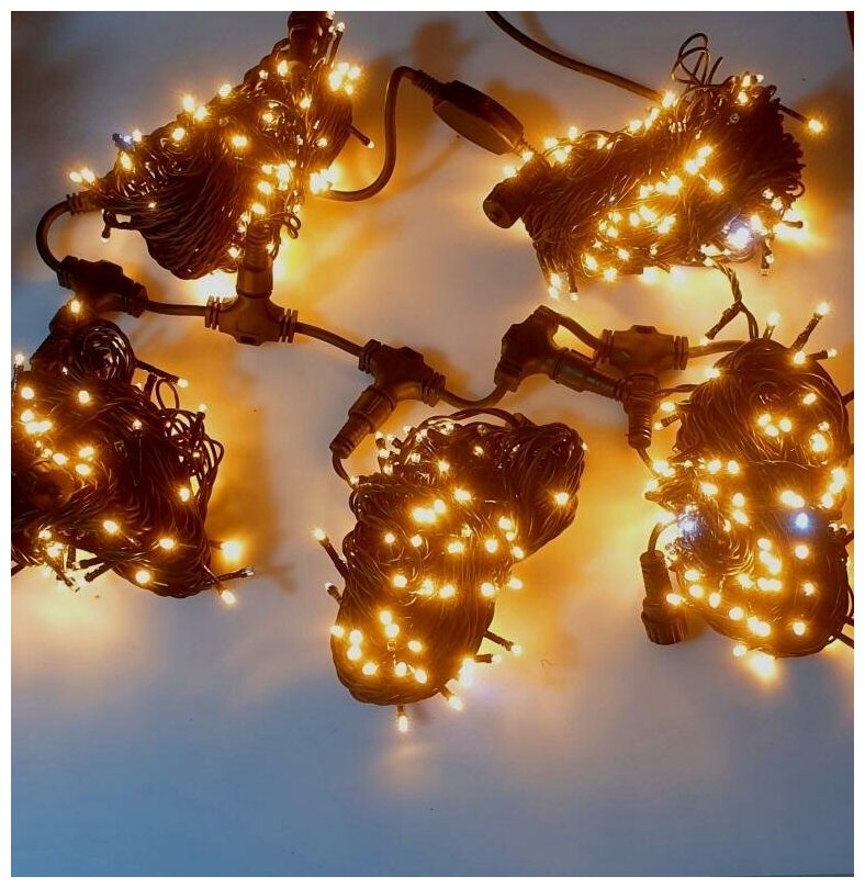 Уличная гирлянда для деревьев 100м. 5 нитей по 20м. Цвет теплый белый с флэш эффектом