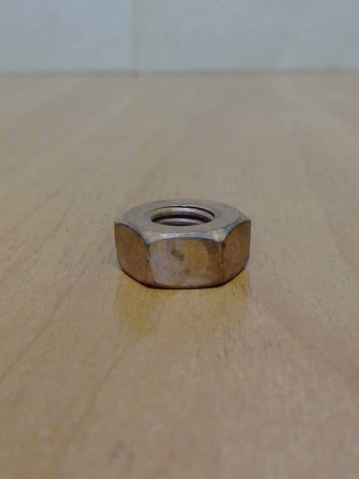 Гайка М10х1.5 омеднённая приёмной трубы, коллектора ключ 17. Высота 8 мм. Россия, Красная Этна. 250512-п5