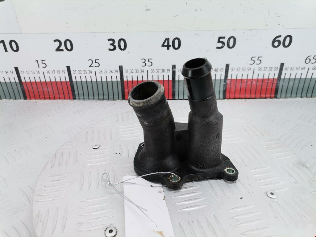 Корпус термостата Ford Fiesta 5 1707050 арт. 1679375