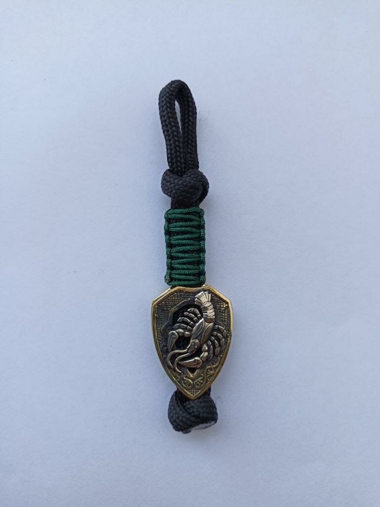 Темляк с бронзовой бусиной Рак