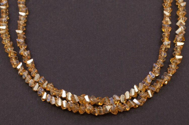 Бусина стеклянная граненая треугольная 3х4х3мм, цвет янтарный, гальваническое покрытие, 542-061, 1 нить (около 30 см, около 125 бусин)