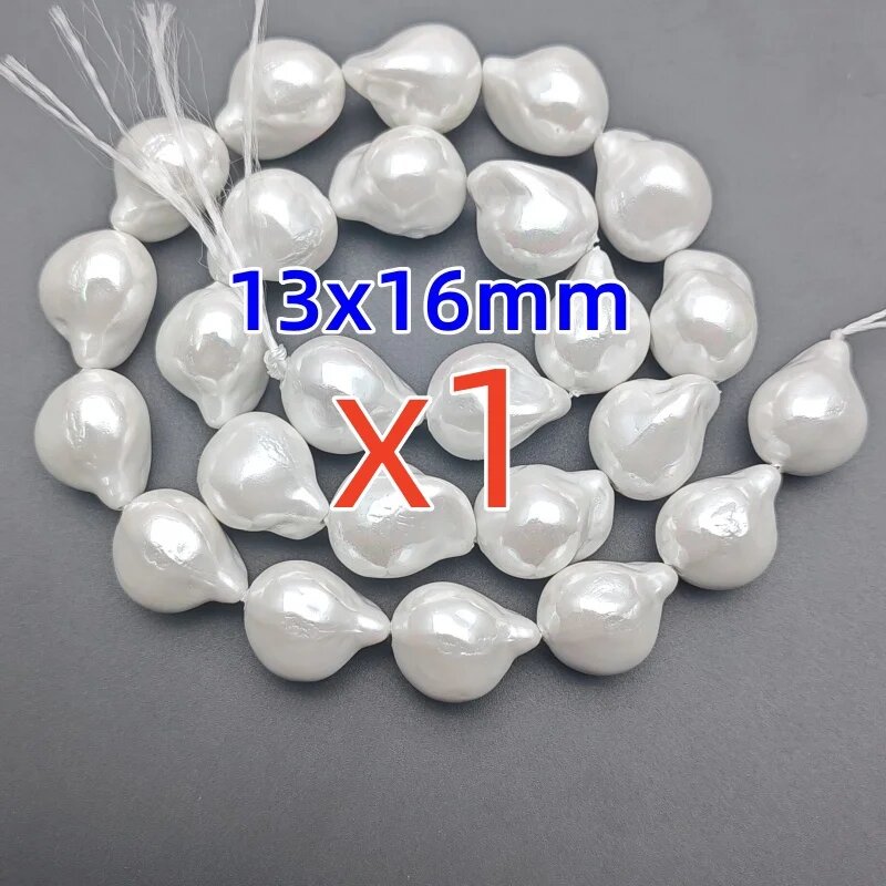 Бусины из ракушки белые 12х14 мм Flourishbeads 1 strand 13x16mm