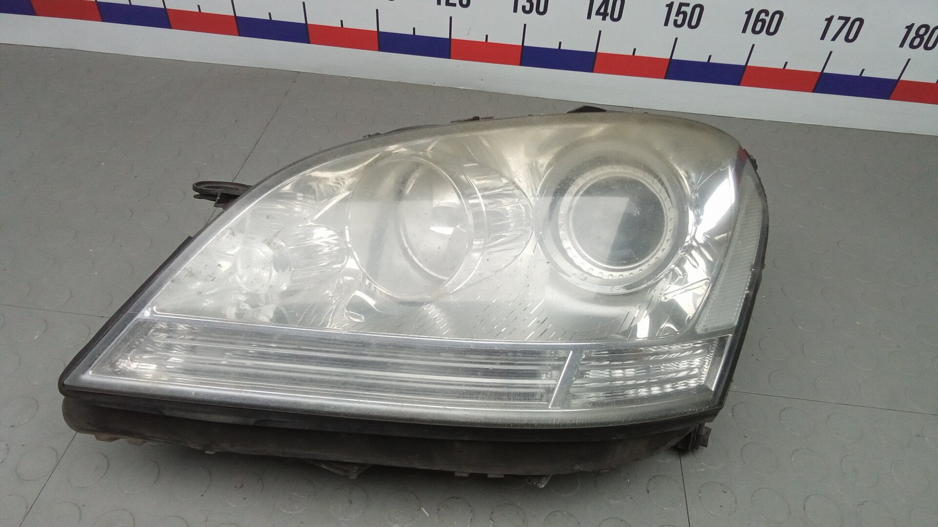 Фара левая MERCEDES BENZ M-CLASS W164