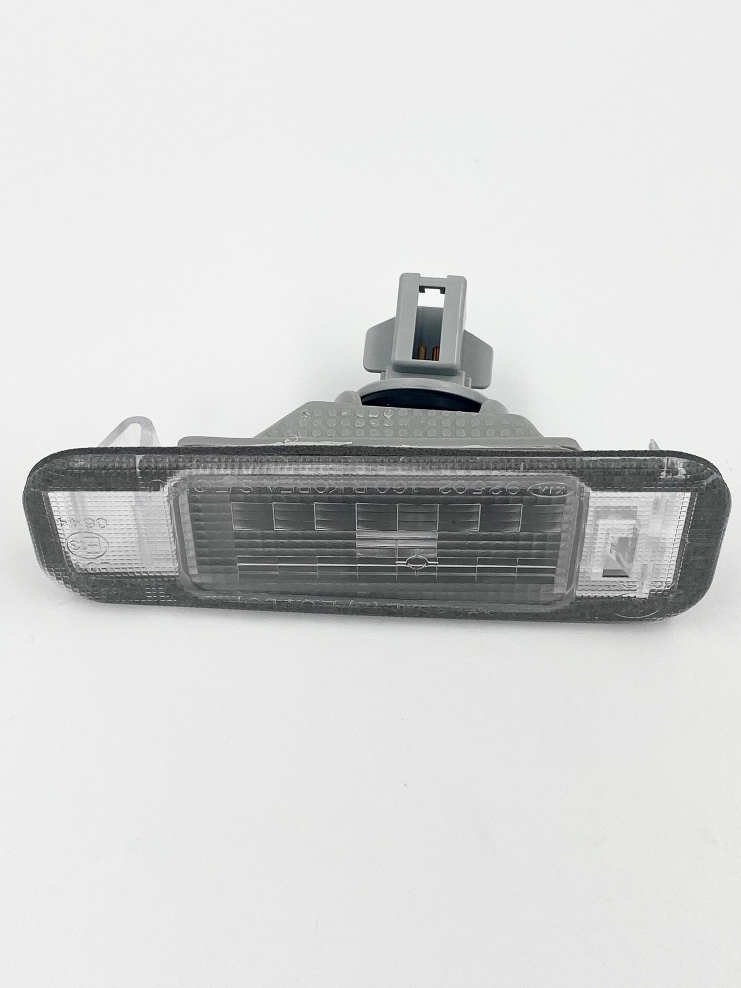 Фонарь подсветки номерного знака правый Kia Rio (JB, QBR) Mobis 925021G000 для Hyundai-KIA