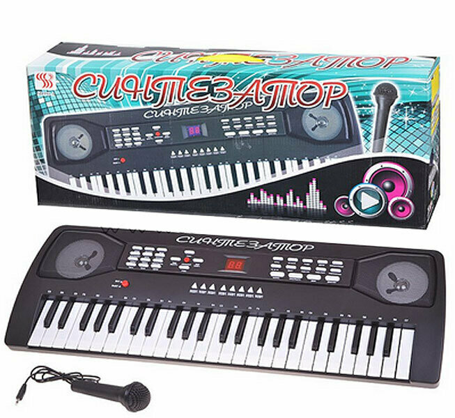 Игрушечный музыкальный инструмент "Синтезатор с микрофоном"