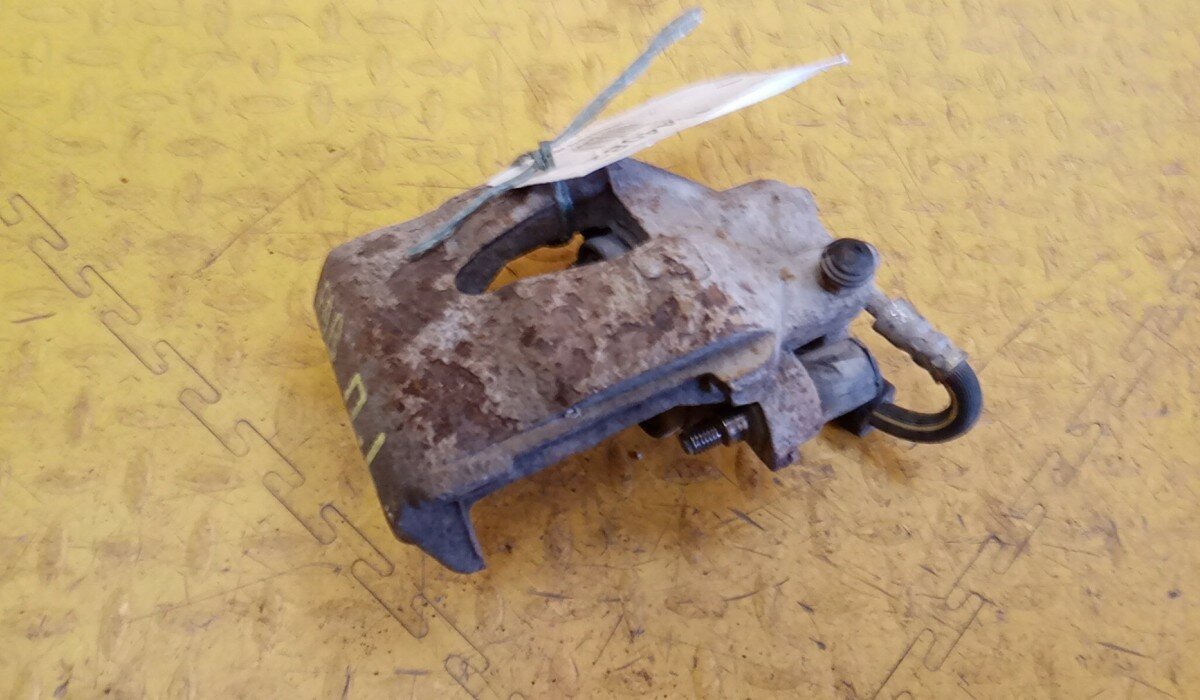 Суппорт передний Fabia II Skoda 1K0615123D