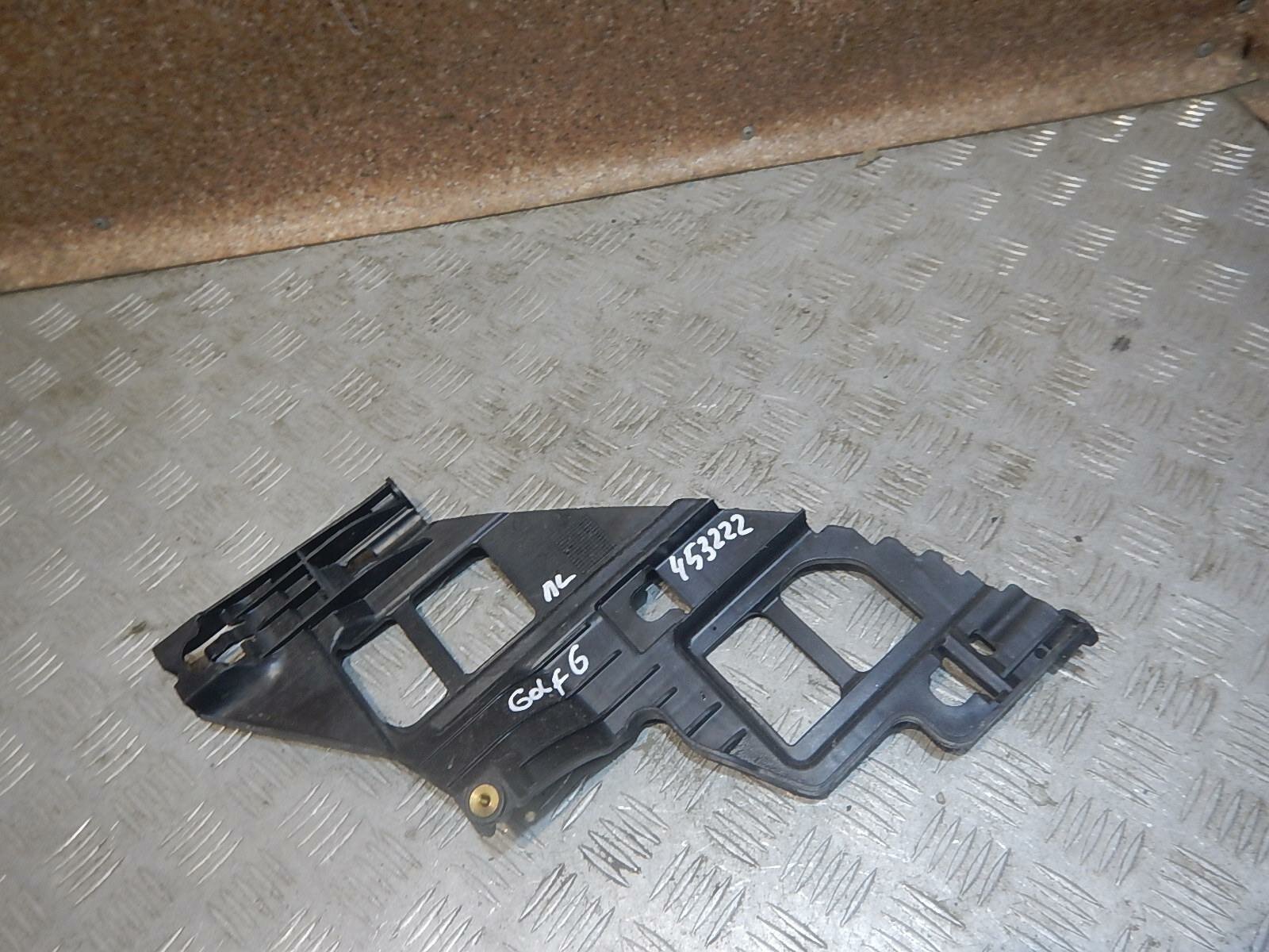 Б/У Кронштейн фары левой, Volkswagen (Фольксваген)-GOLF VI (09-12) VOLKSWAGEN GOLF VI (09-12) Новый. 453222 VAG арт. 5K0...