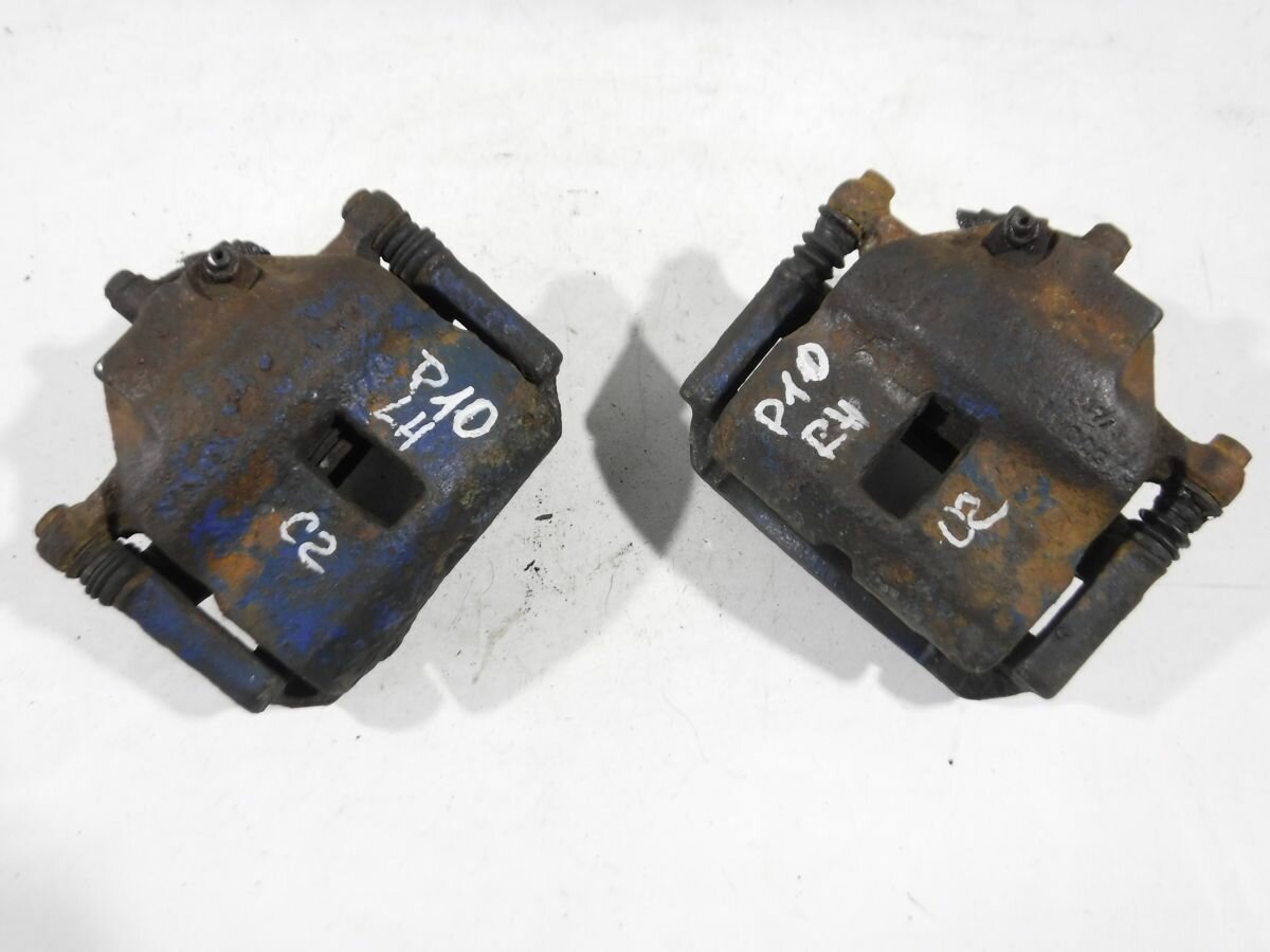 Суппорт тормозной передний Nissan Primera P10 (1990—1995) 410113F000