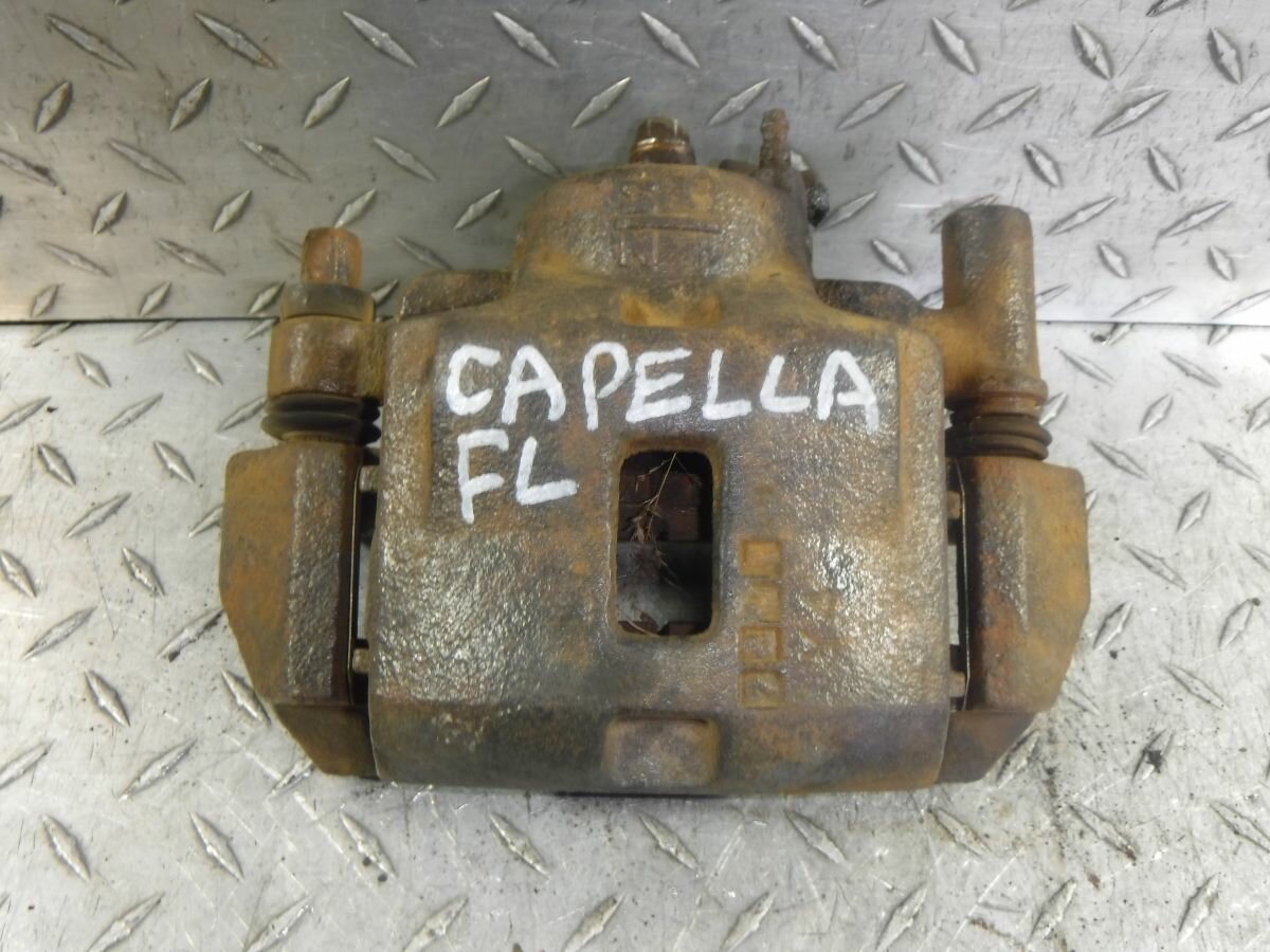 Суппорт тормозной передний левый Mazda Capella CG (1994—1997) GA5R3371X