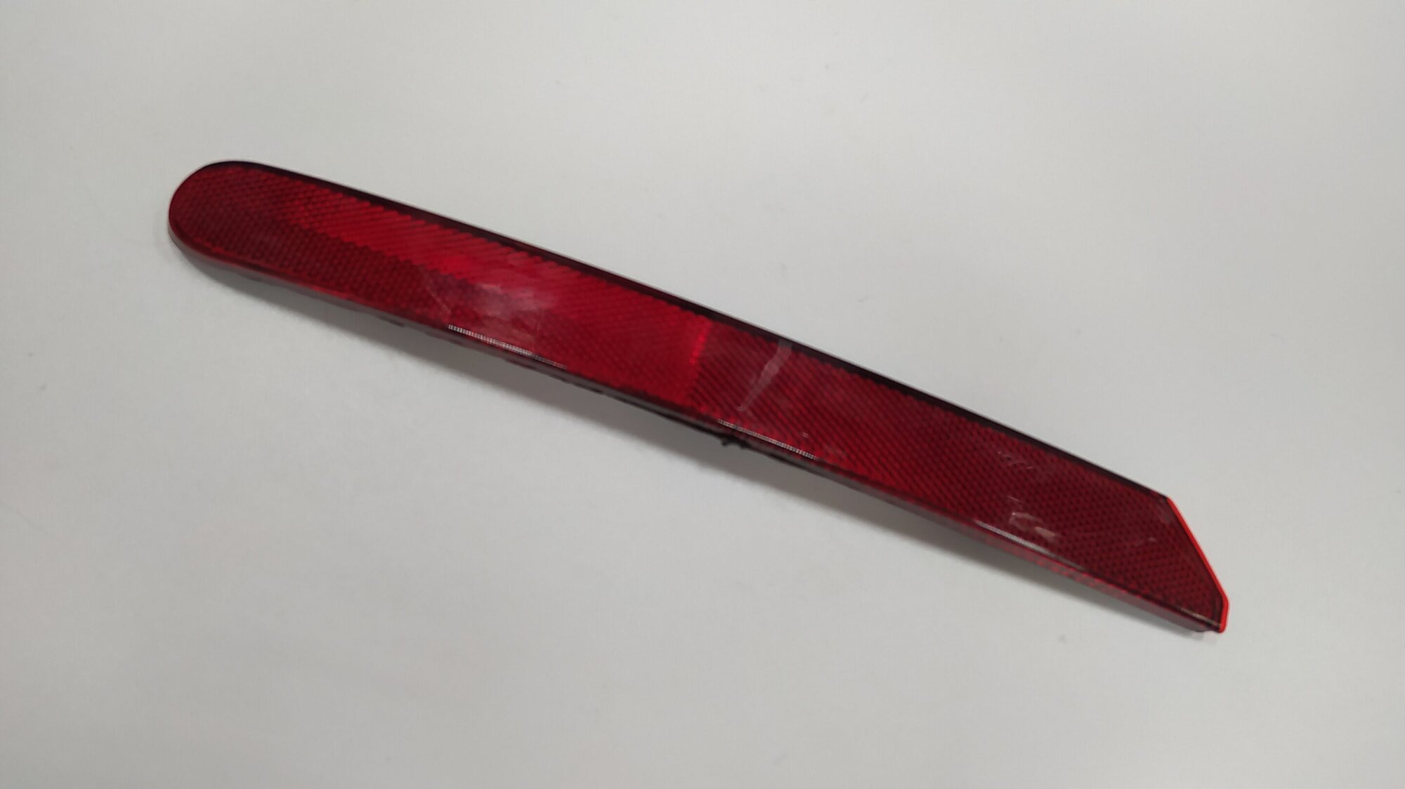 Катафот бампера заднего левый Geely Emgrand EC7 [1.5 16V 5MT хетчбэк] 1067002040