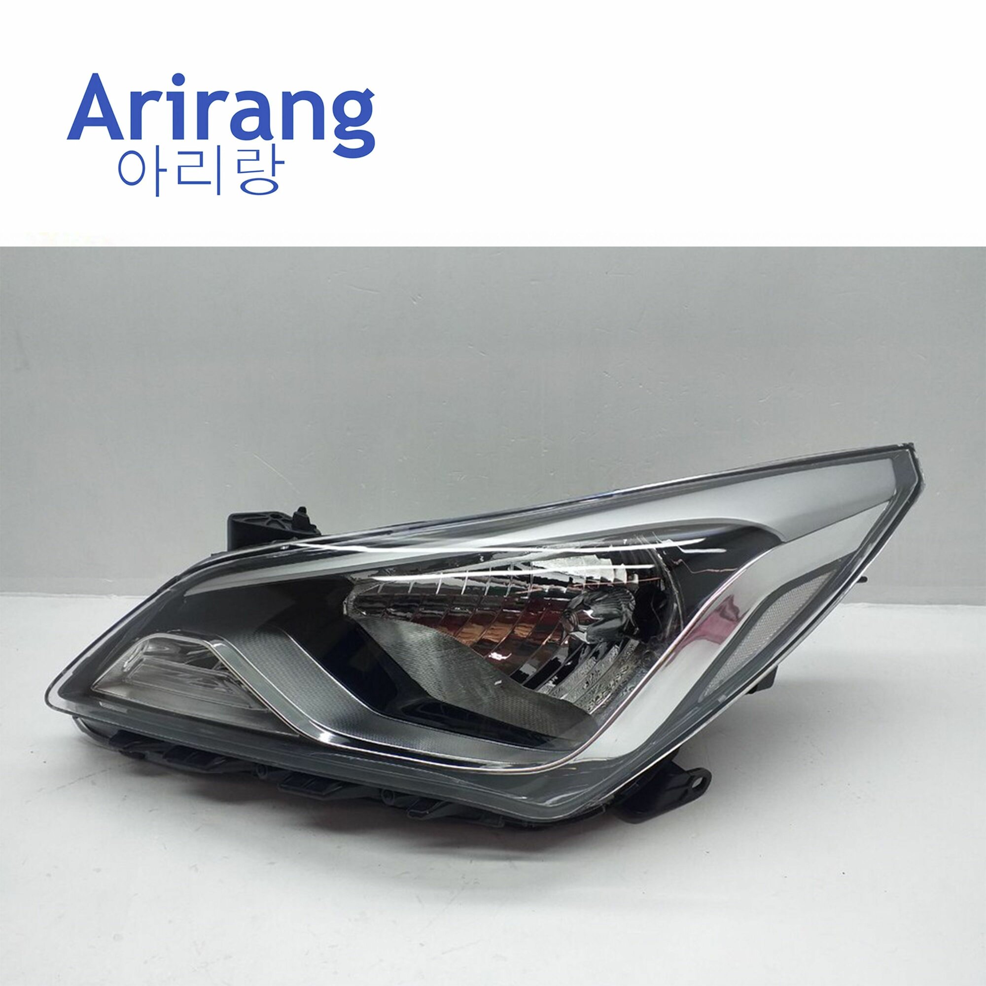 Фара автомобильная передняя левая c отражателем без корр для Hyundai Solaris 2014-2017 / арт. ARG231083LTAXI / бренд ARIRANG / OEM 921014L600