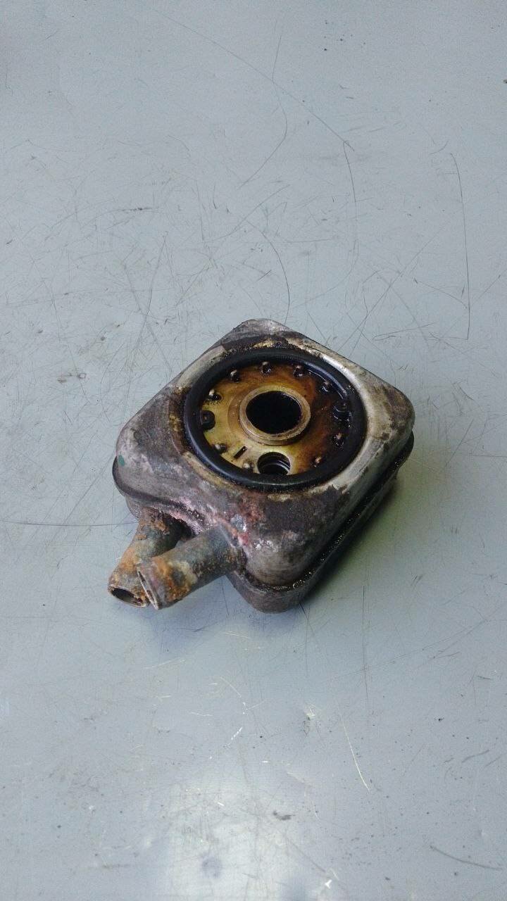 Теплообменник масляного фильтра Volkswagen Passat B5 1999