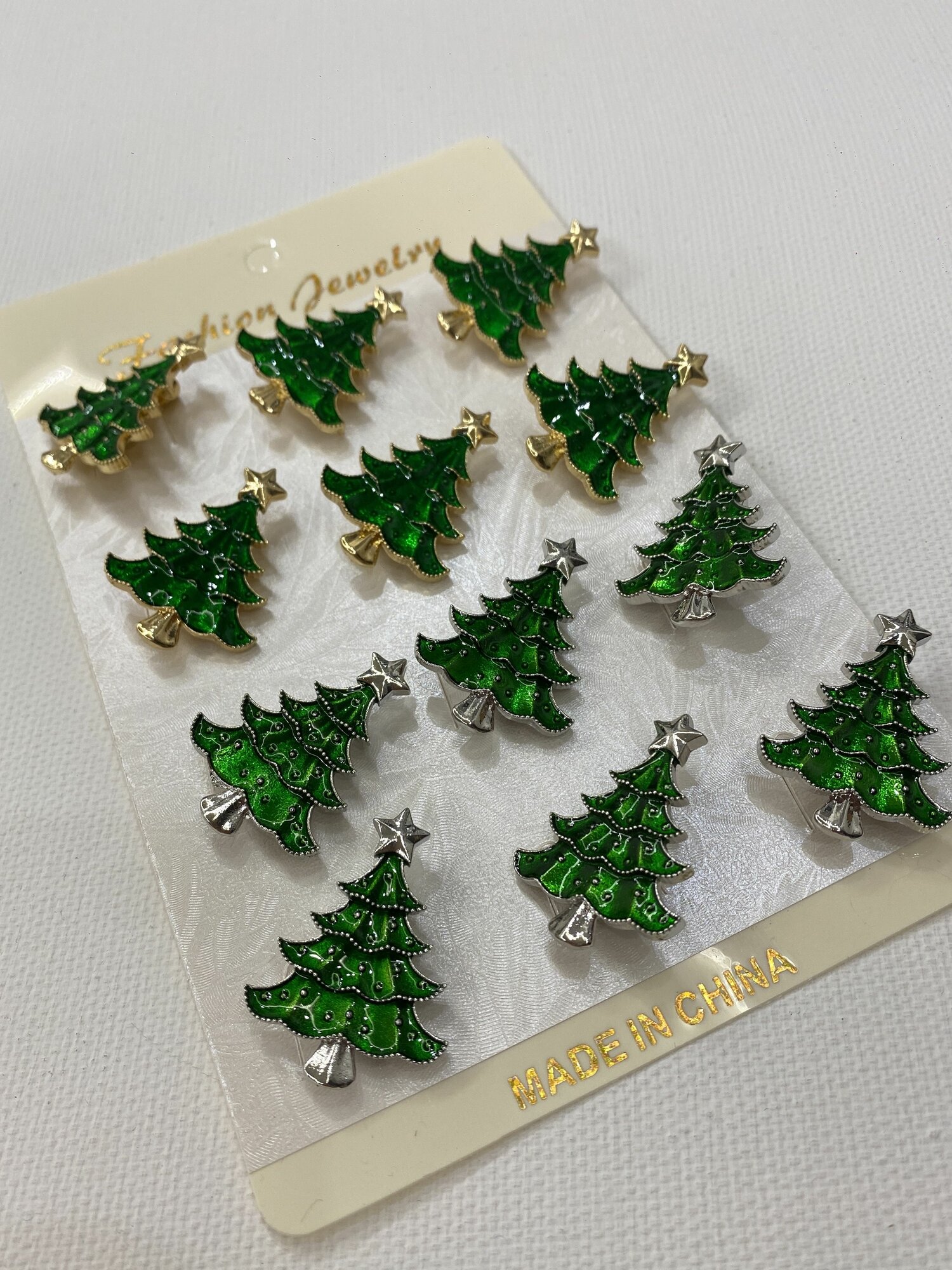 Комплект брошей