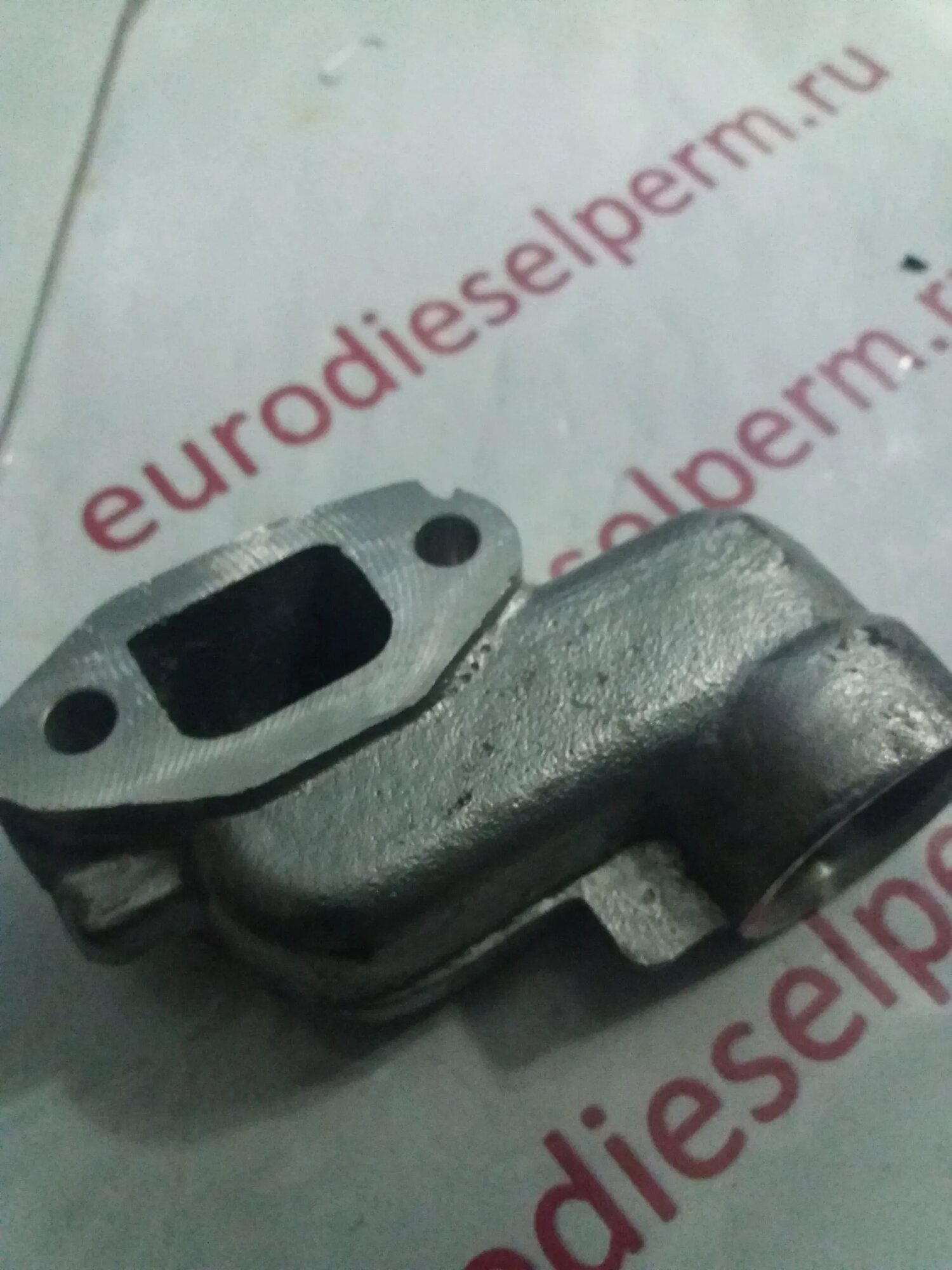 Патрубок отводящий РОГ ЯМЗ 534