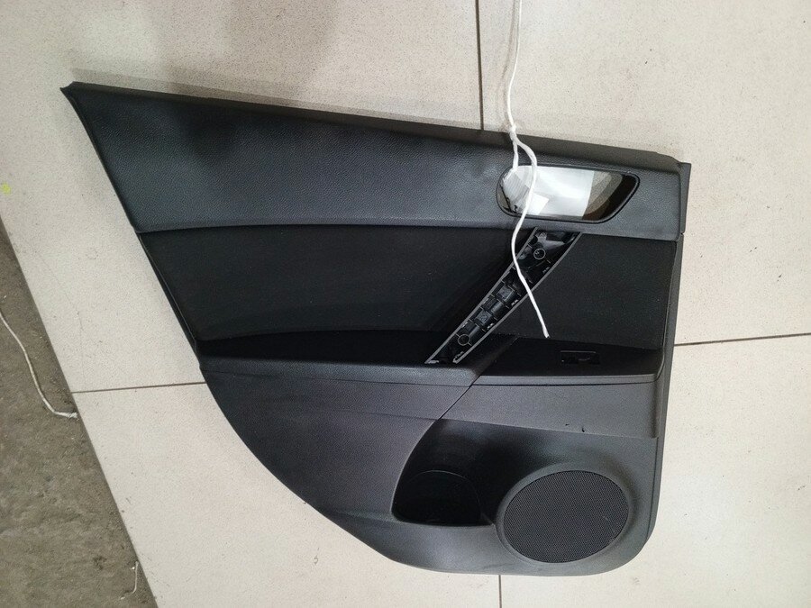 Обшивка двери задней левой от Mazda 3 BL 2009-2013