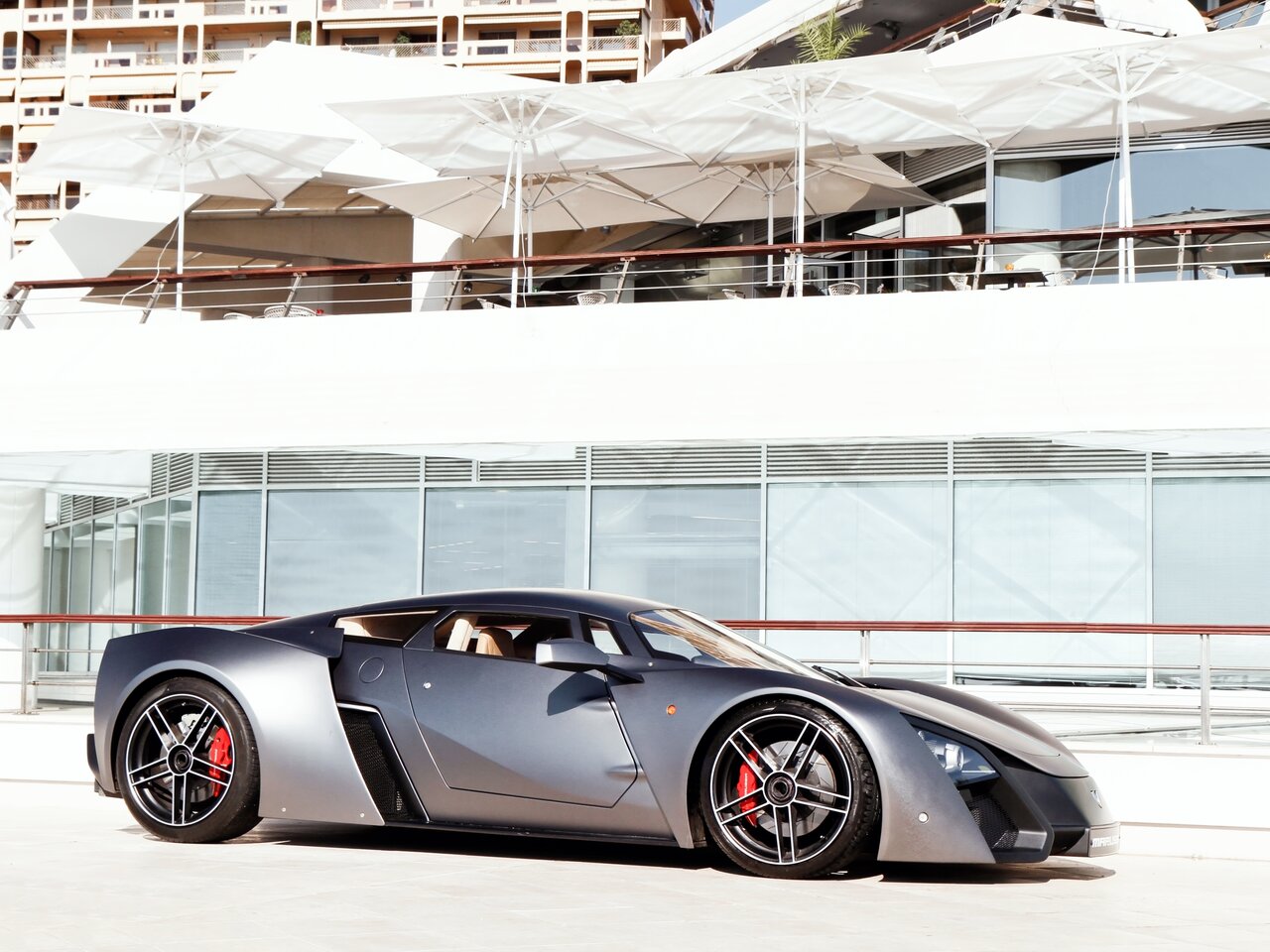 Сравнение Aston Martin V12 Speedster и Marussia B2 по характеристикам, стоимости покупки и ...