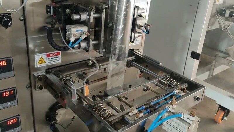 MK 211 Small pouch packaging machine integrated with volumetric cup ...