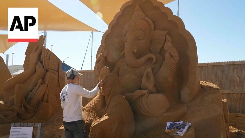 Sculptors show their creations at sand sculpture festival in Denmark ...